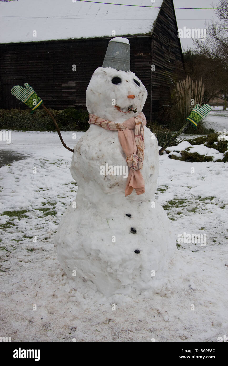 snowman snow winter scene Stock Photo - Alamy