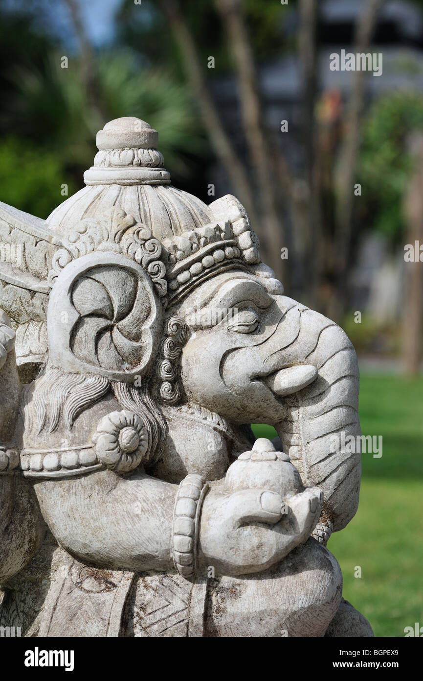 Indian Ganesha statue, showing the head of an elephant and the body of ...
