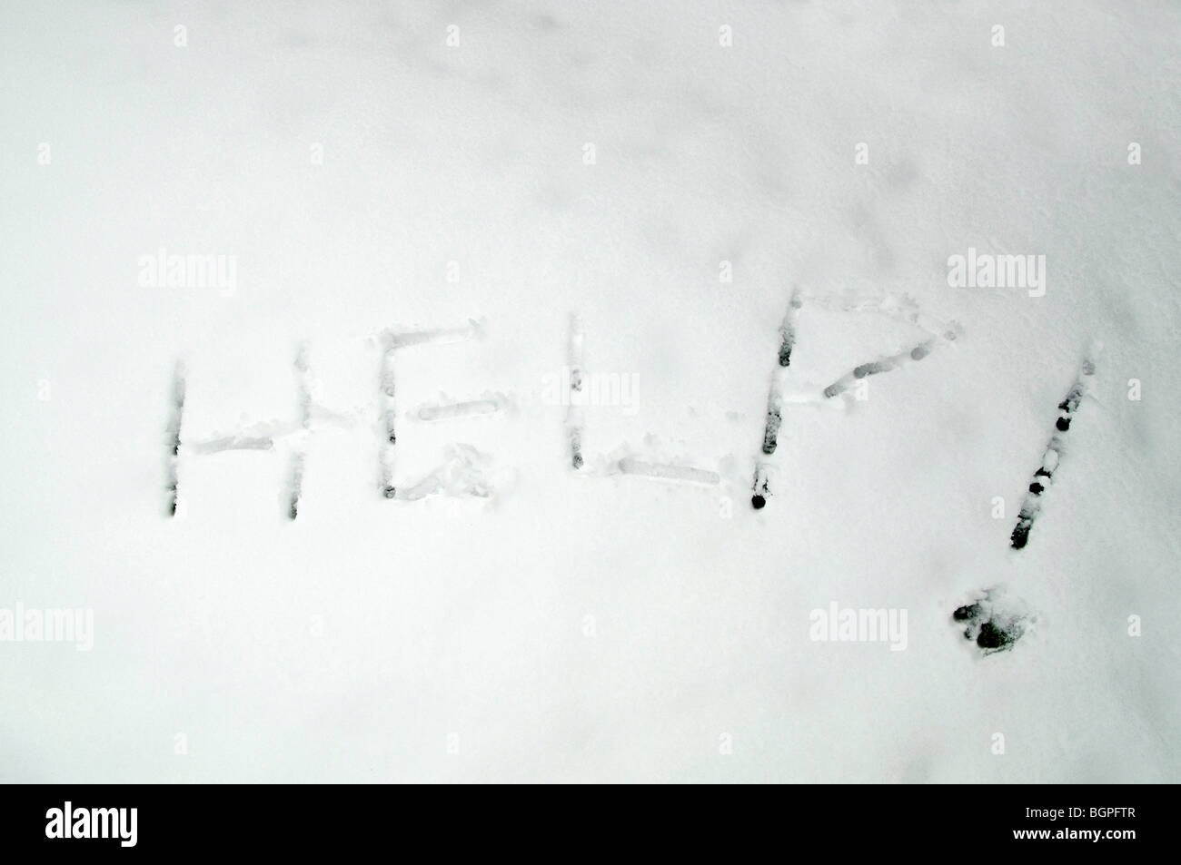 a help message written in the snow to be seen from above for rescue ...