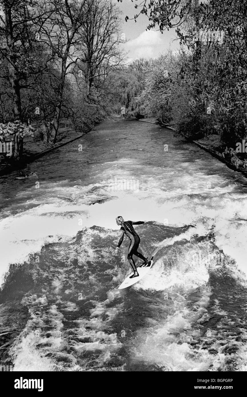 Surfer practicing on the Eisbach river, Munich, Germany Stock Photo - Alamy