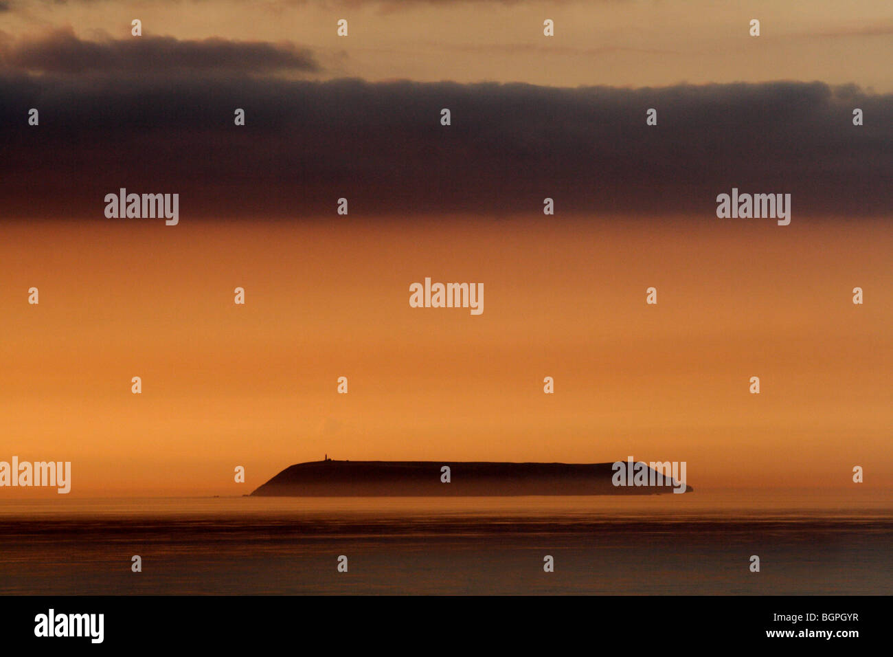 Lundy island bristol channel misty sunset Stock Photo - Alamy