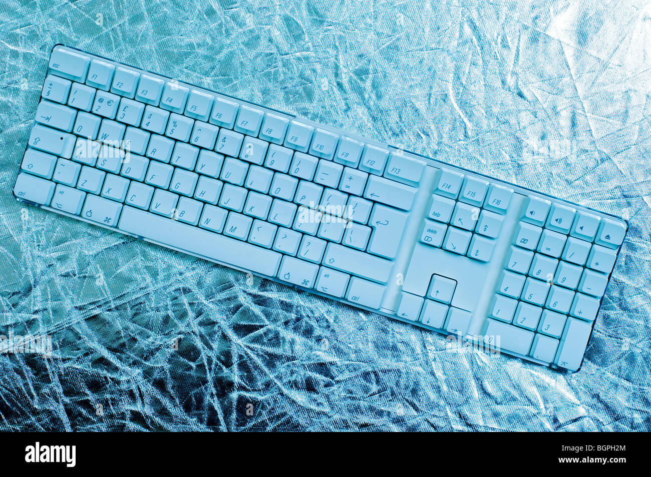 Computer keyboard from above on crinkled foil background Stock Photo ...