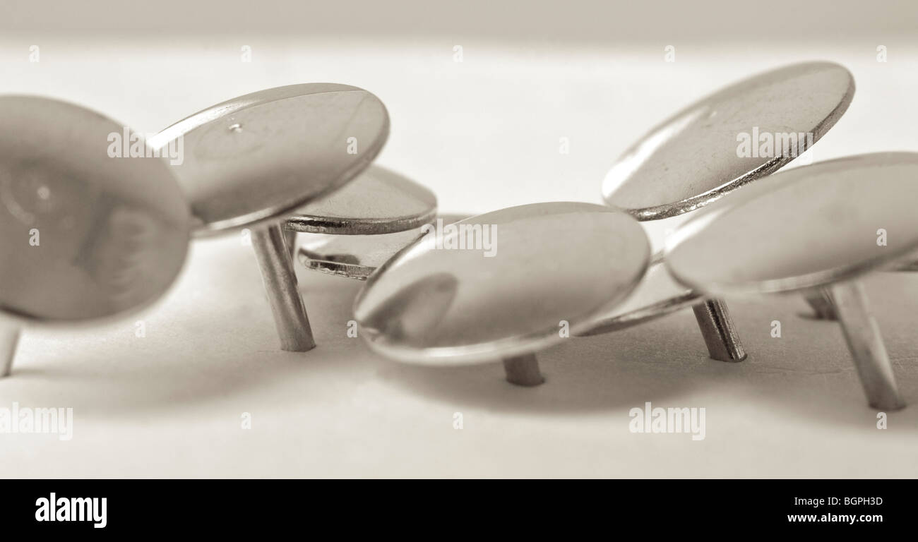 Close up of group of drawing pins Stock Photo - Alamy