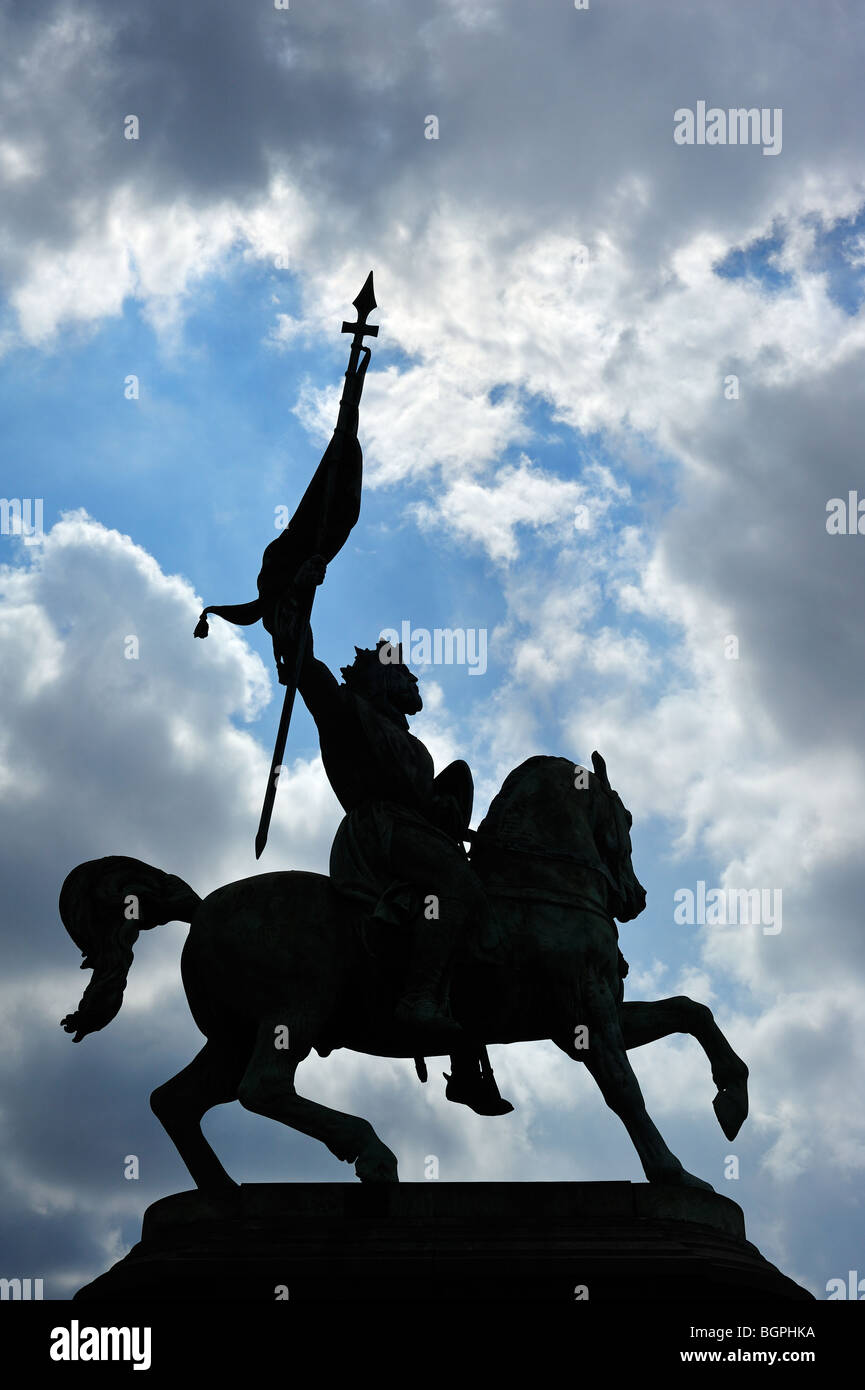Silhouetted equestrian statue of Godfrey of Bouillon at the King's ...