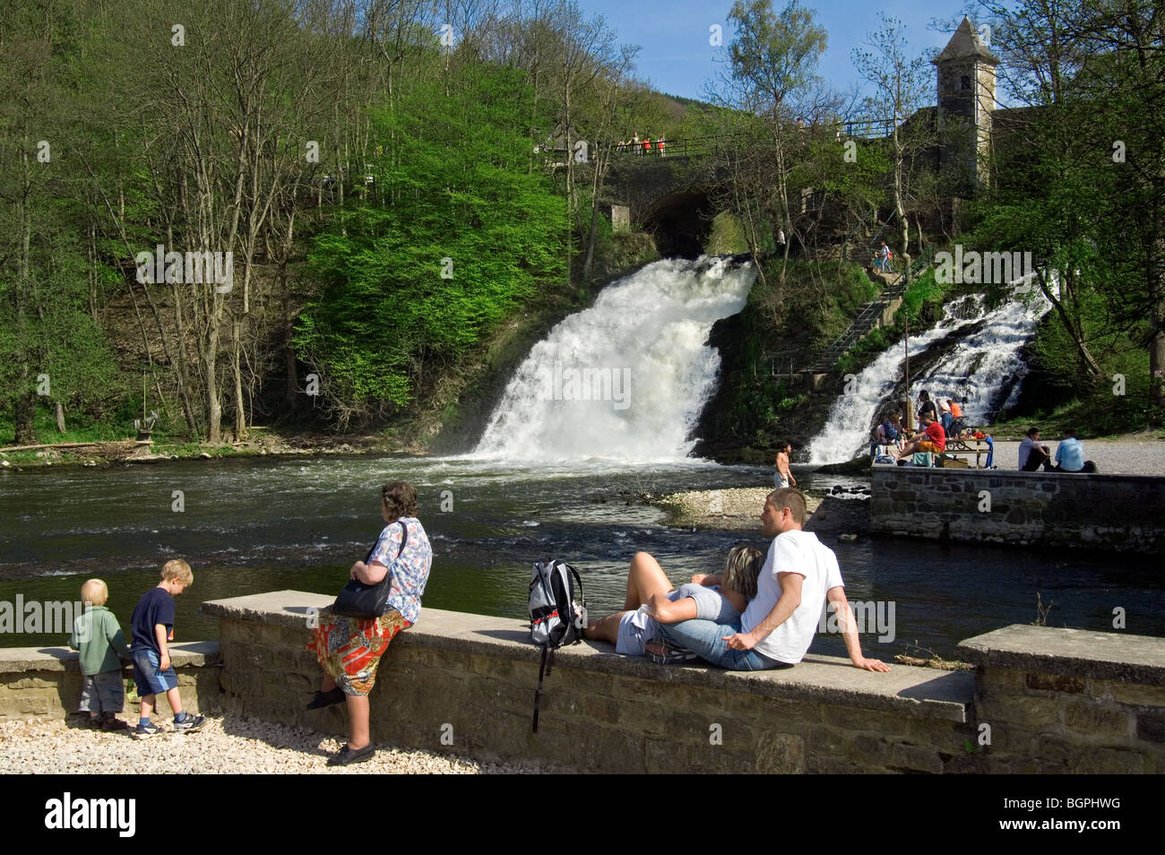 Tourists at the river Amblève and the waterfalls of Coo, Stavelot ...