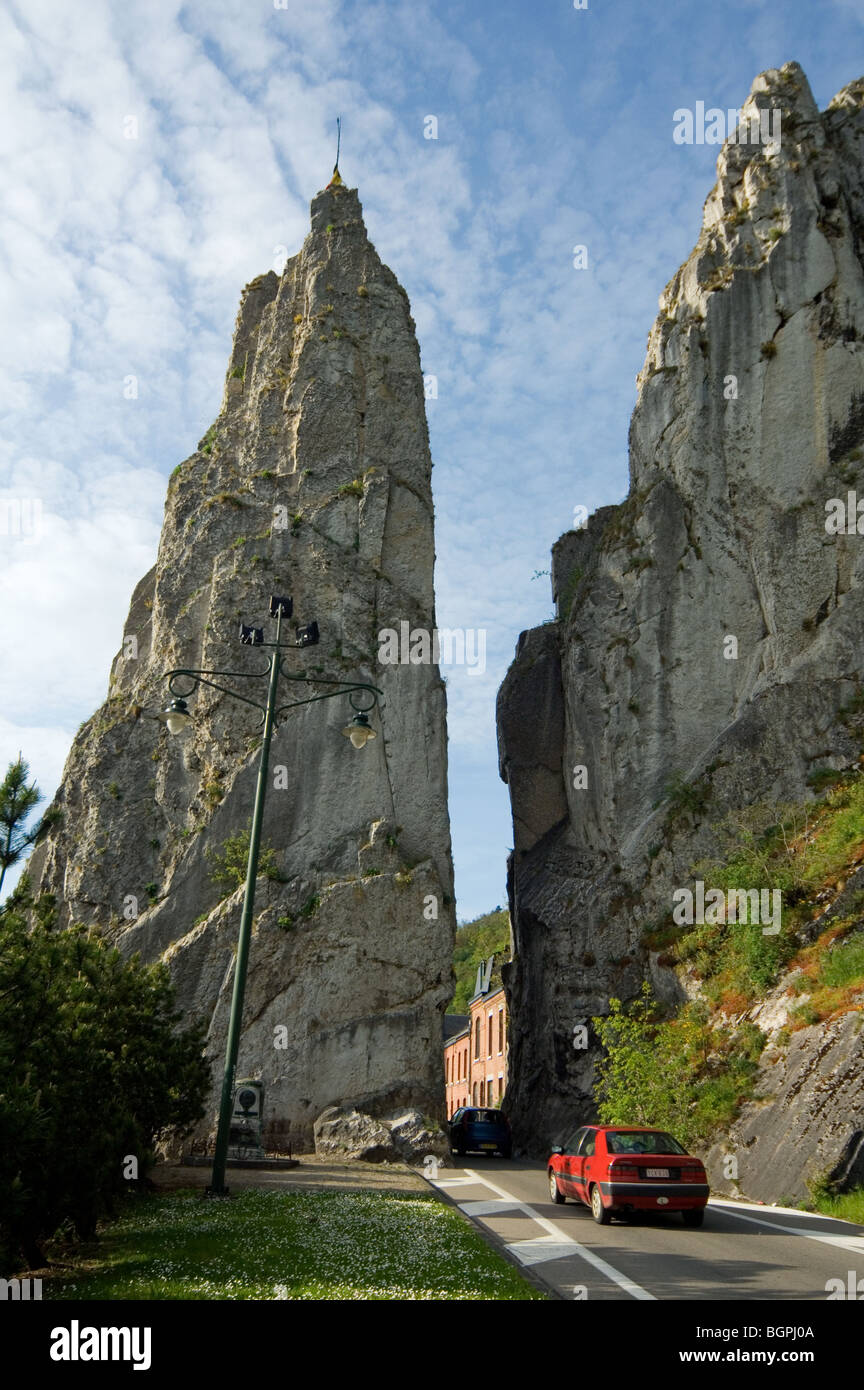 Car driving past the rock formation Rocher Bayard at Dinant along the ...