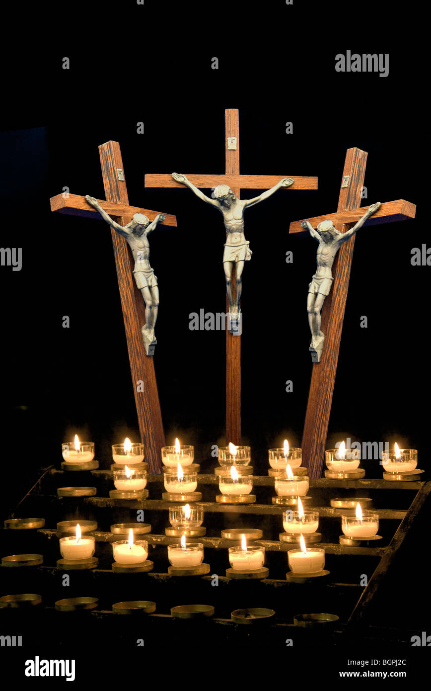 Three crosses depicting crucifix with candles Stock Photo - Alamy