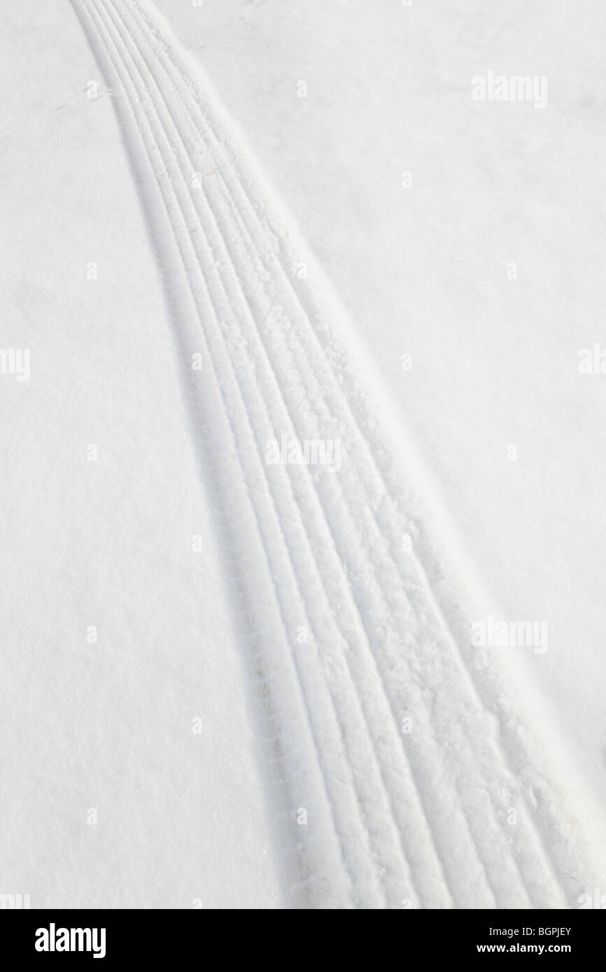 Tire tracks in snow Stock Photo - Alamy
