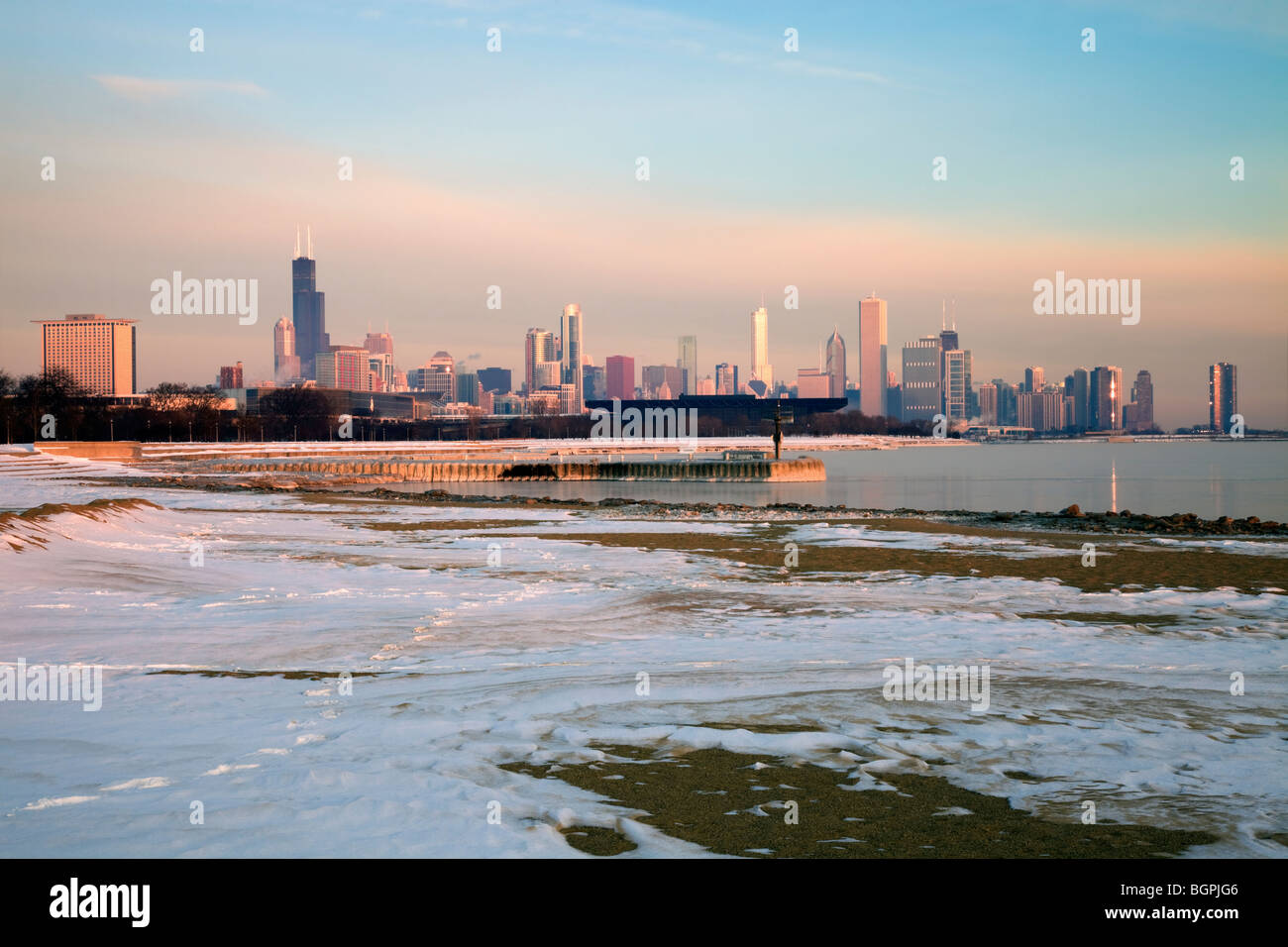 Sunrise from snowy beach Stock Photo - Alamy
