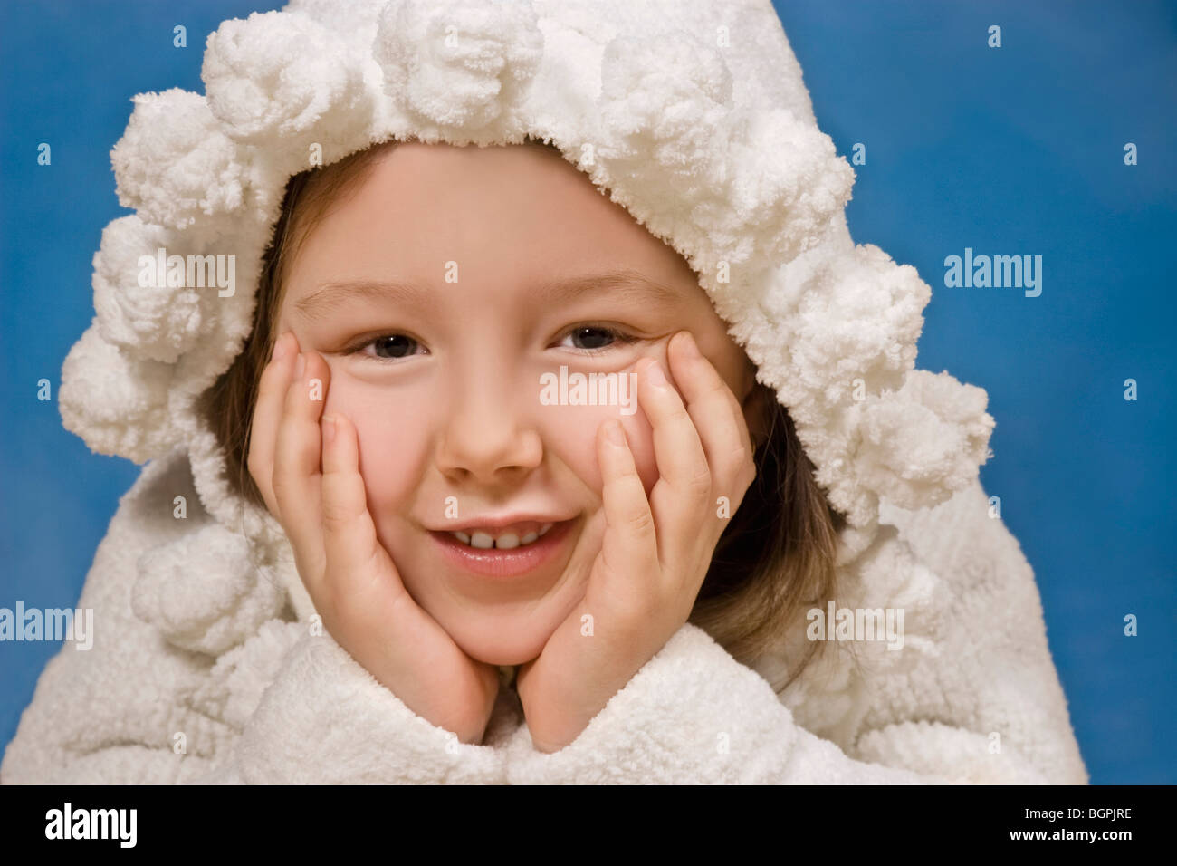 Portrait of a young girl in robe with hood Stock Photo - Alamy