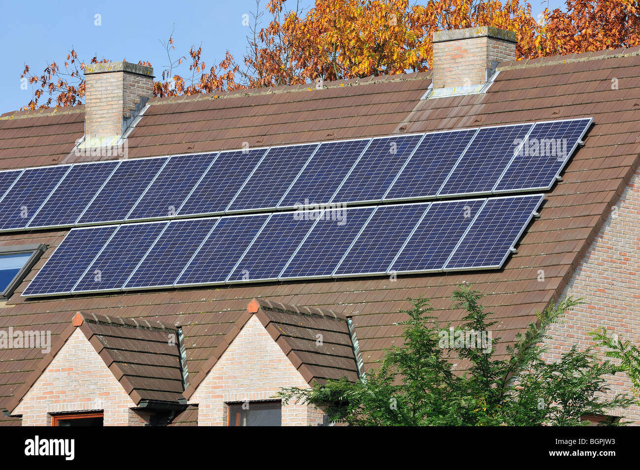 Photovoltaic solar panels on roof of house Stock Photo - Alamy