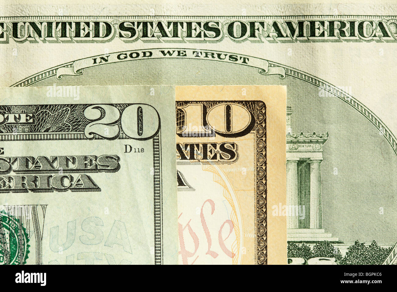 Twenty and ten dollars bills making year 2010 concept Stock Photo - Alamy