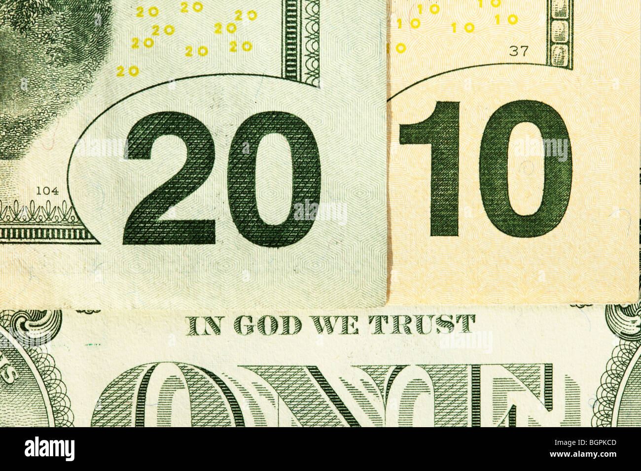 Twenty and ten dollars bills making year 2010 concept Stock Photo - Alamy