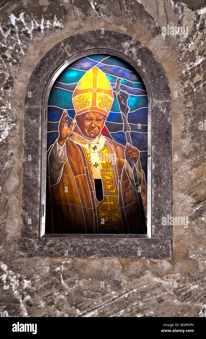 Illuminated stained glass window of Pope John Paul II deep underground ...