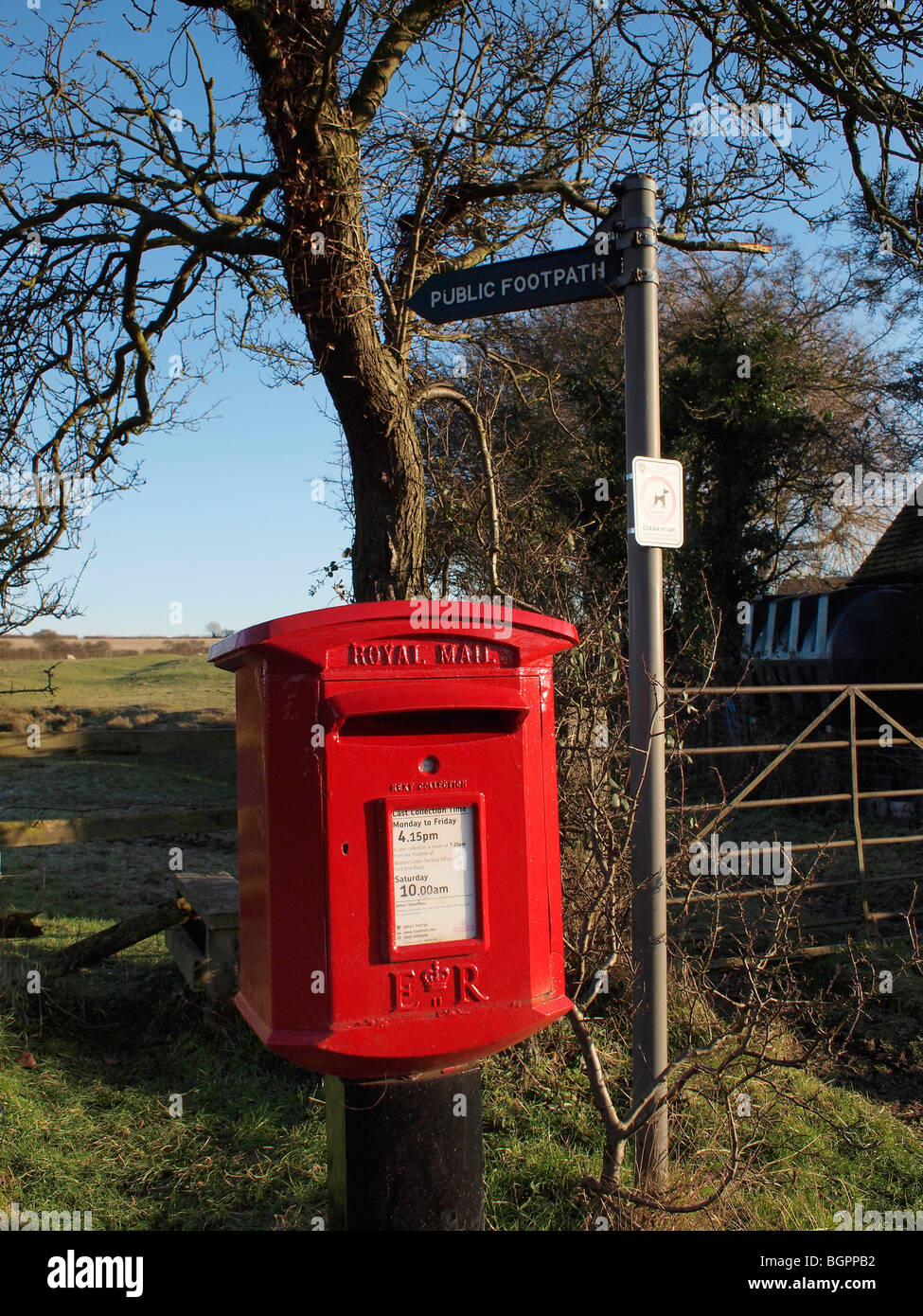 postbox in wall outside house in village Stock Photo - Alamy