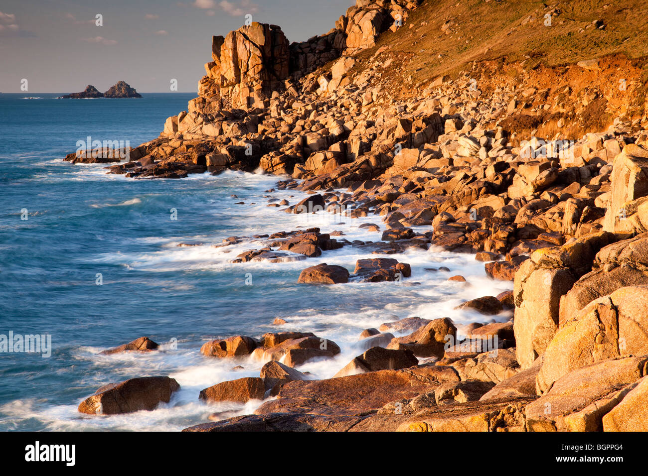 Evening light on the Cornish coast near Gwenver Beach, Cornwall England ...