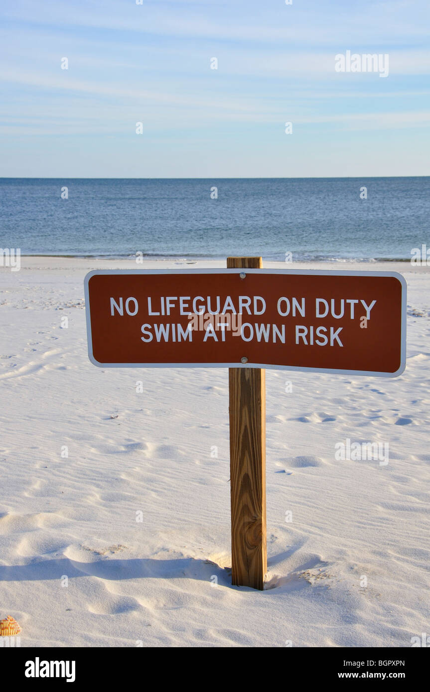No lifeguard on duty, swim at own risk sign Stock Photo - Alamy