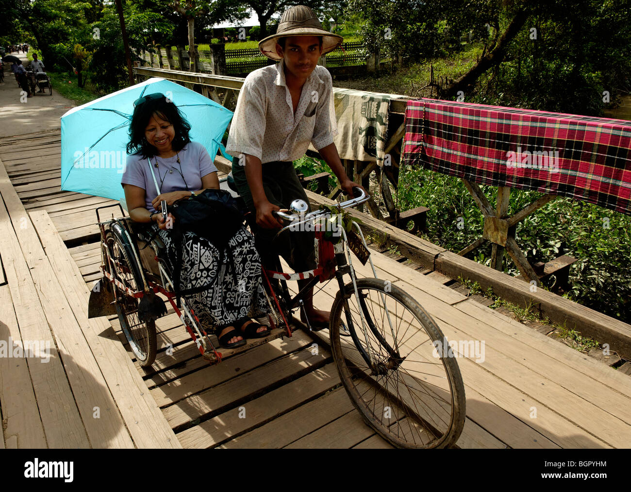 Woman tourist on a rickshaw ride in Yangon (Rangoon), Myanmar (Burma ...