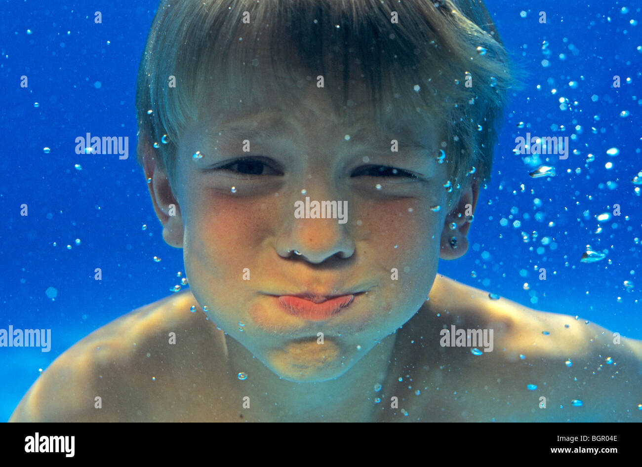 portrait of a young boy diving Stock Photo - Alamy