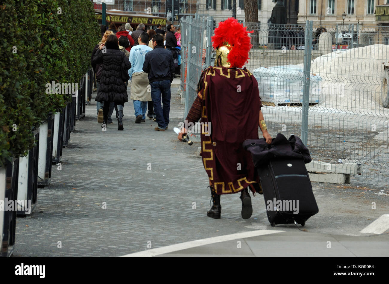 Actor dressed as Roman soldier on his wayhgome from work in the Roman ...