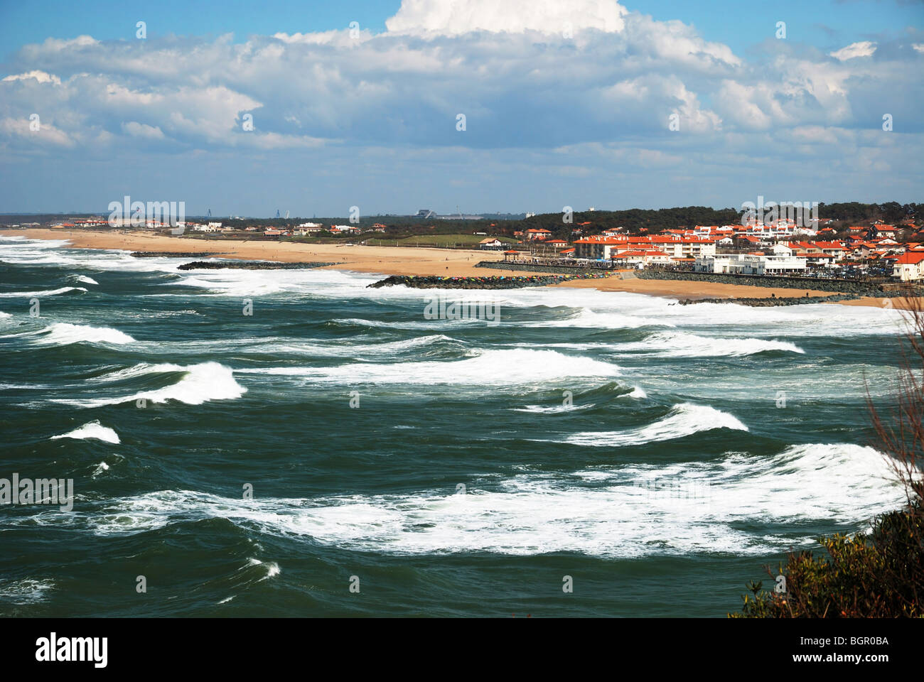 Continuous waves surging towards oceanfront near Biarritz Stock Photo ...