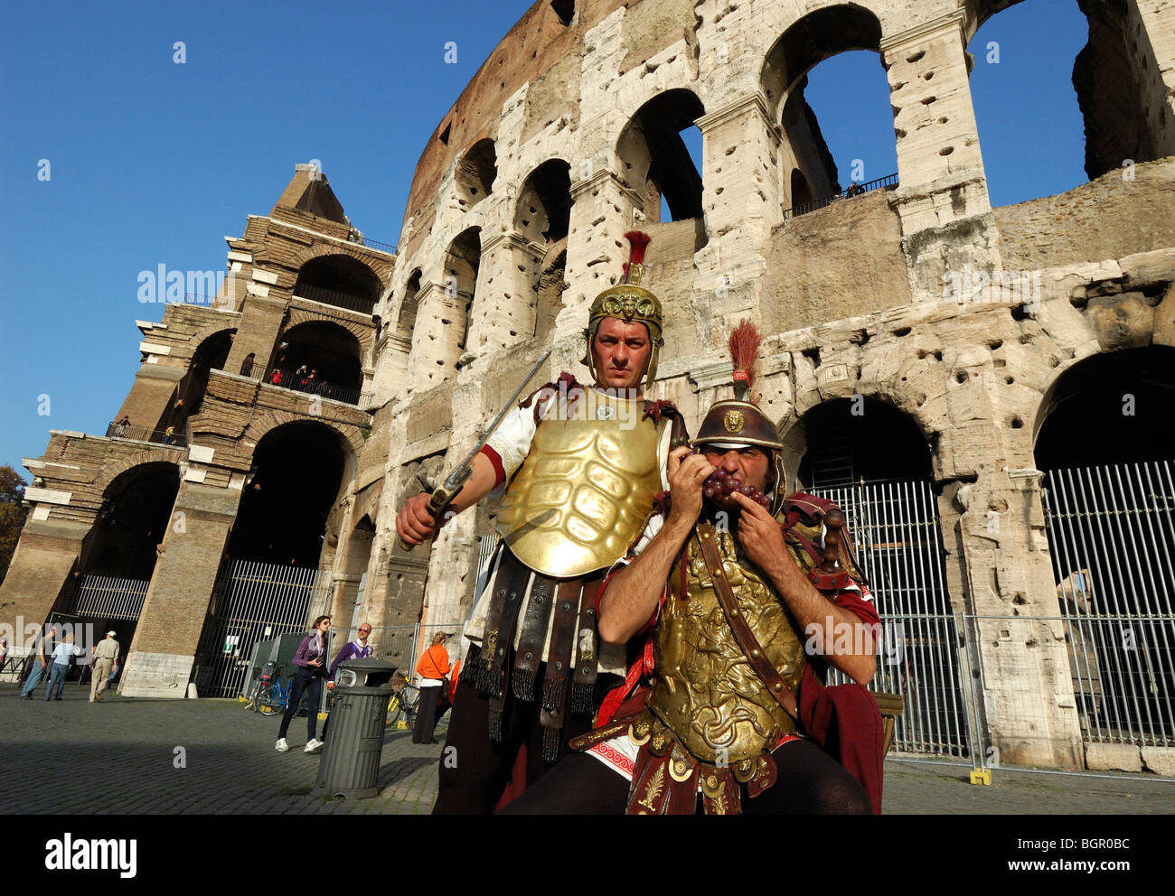 Actors dressed as Roman soldiers posing for tourists in front of ...