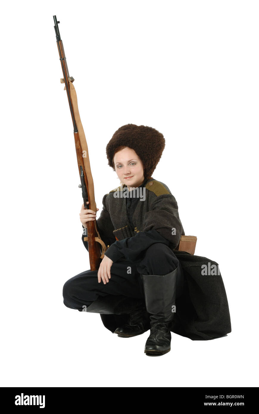 Russian Cossack smiling with rifle in squatting position Stock Photo ...