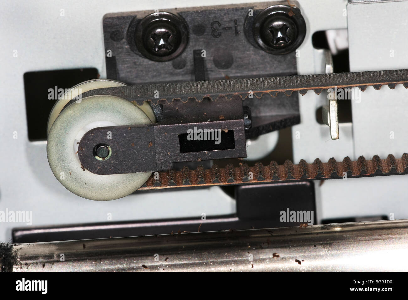 Cog and drive belt Stock Photo - Alamy