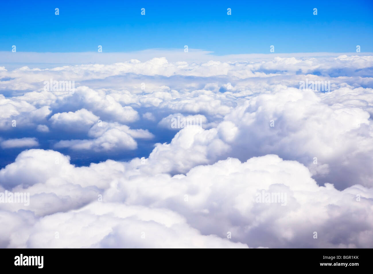 Clouds as viewed out the window of an airplane Stock Photo - Alamy