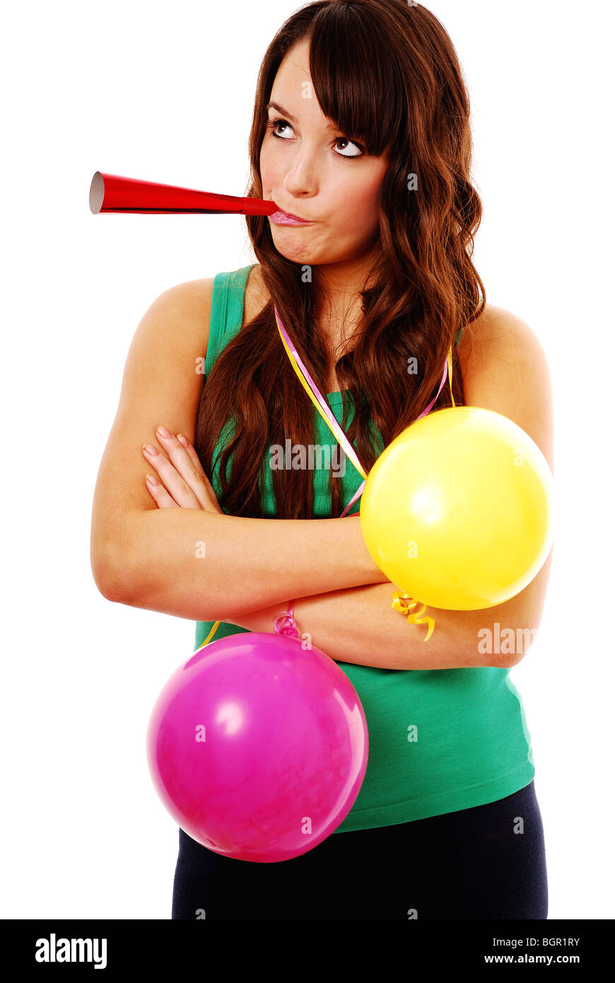 Young woman looking bored at party Stock Photo - Alamy