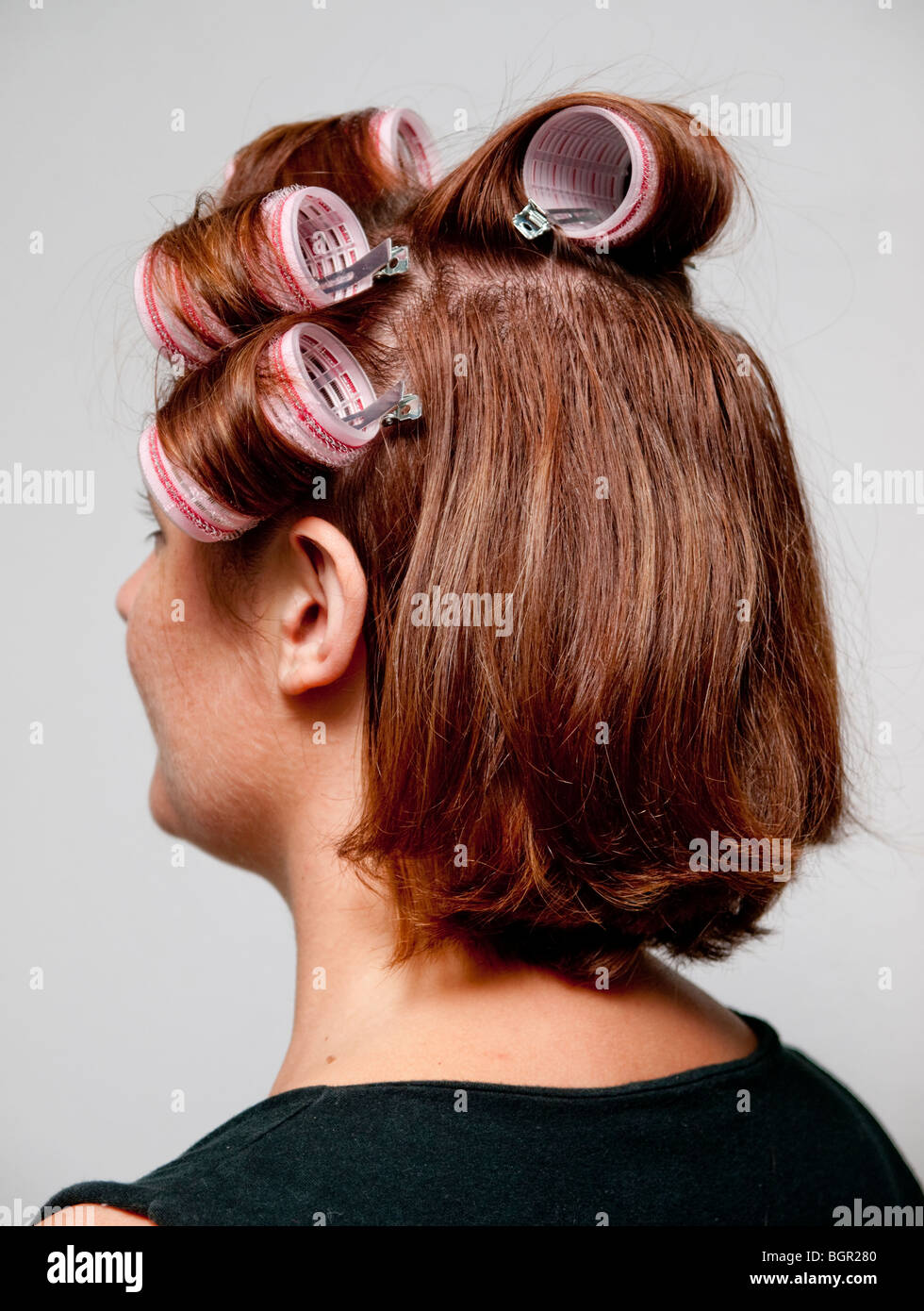 Woman with big curlers Stock Photo - Alamy