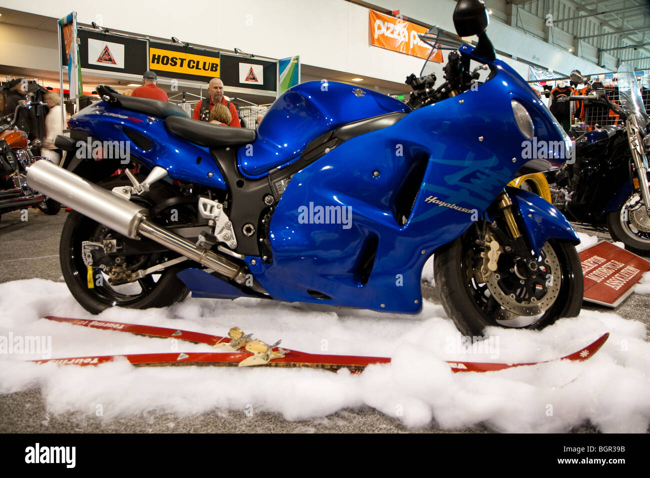 A blue sports bike on display with ski on the side Stock Photo - Alamy