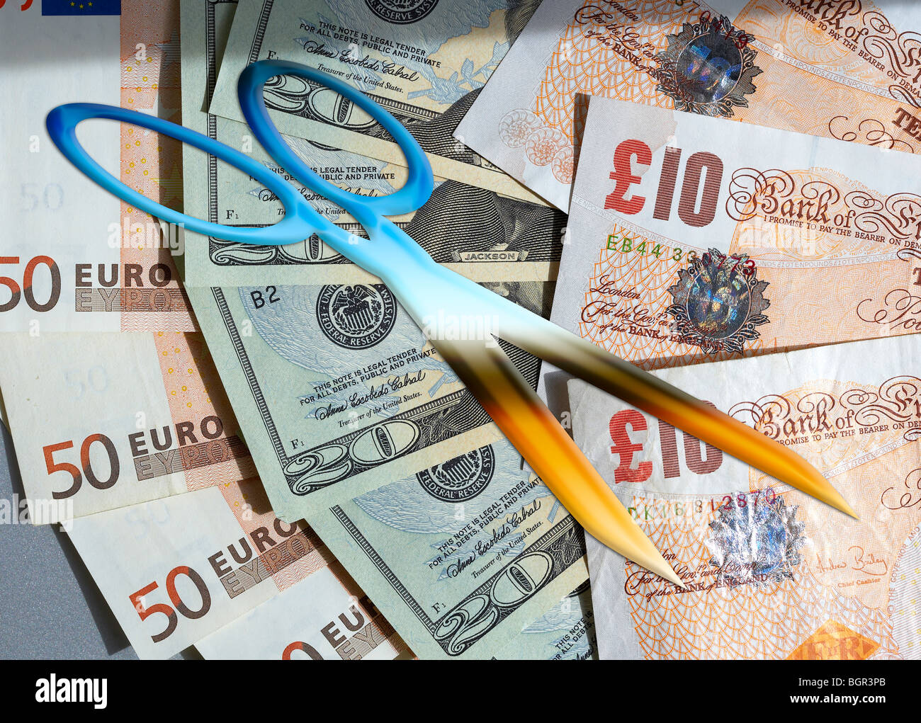 Us money scissors hi-res stock photography and images - Alamy