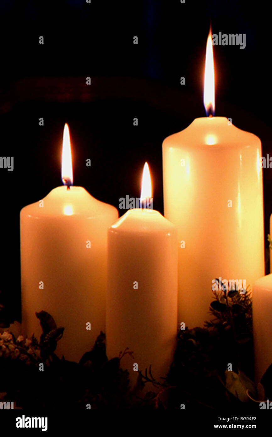 three burning candles Stock Photo - Alamy