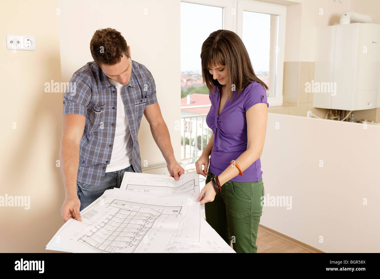 Couple making plans in hi-res stock photography and images - Alamy