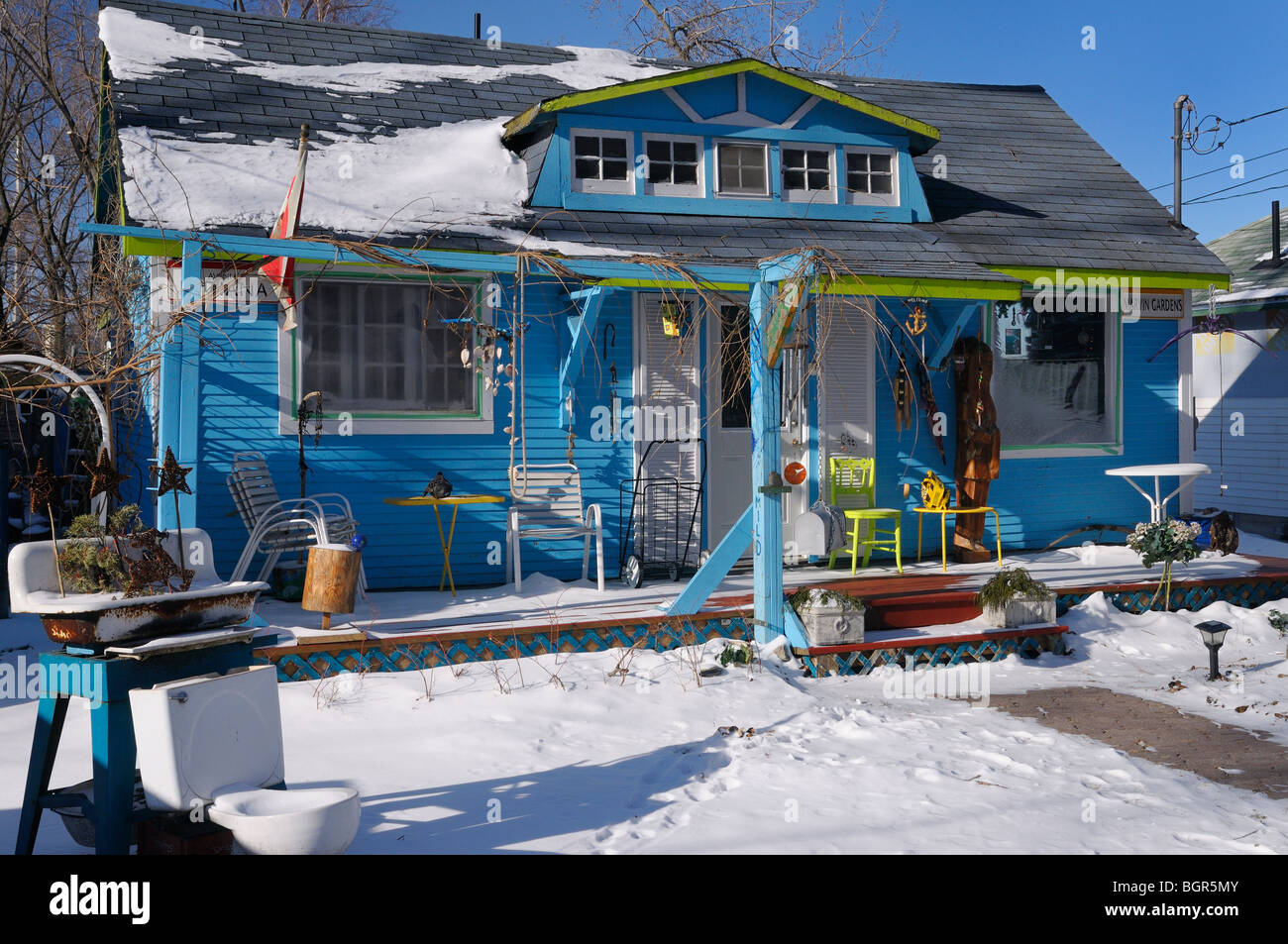 Whimsical blue house with nicknacks on Wards Island Toronto in winter ...