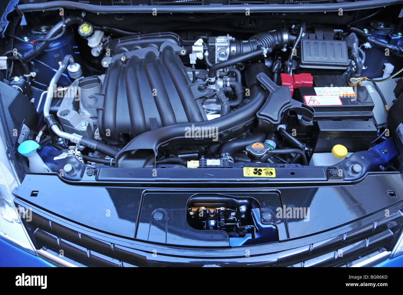 Under the bonnet close up of a blue Nissan Note hatchback motor car ...