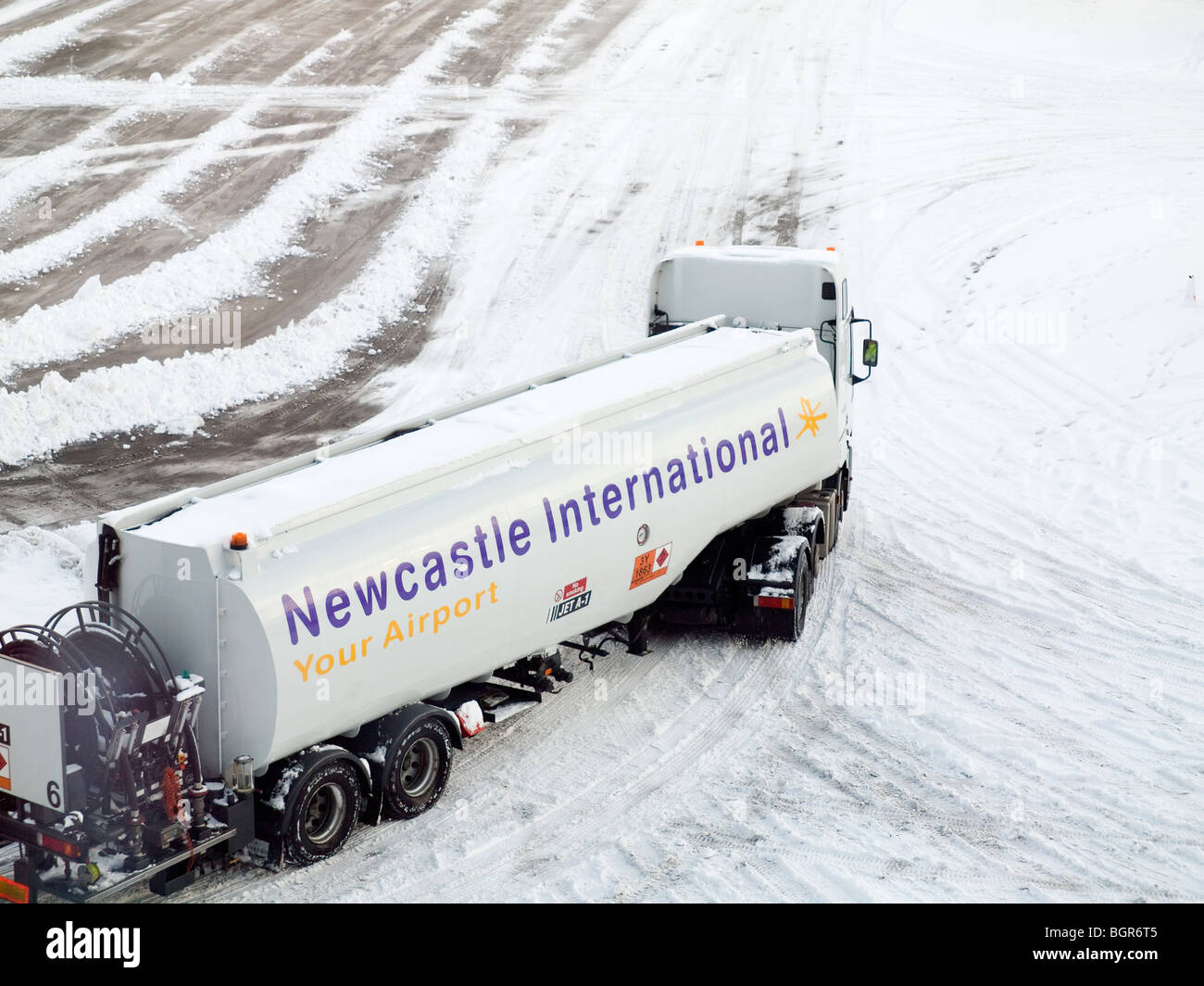 Aircraft refuelling bowser working on the apron at Newcastle Airport ...