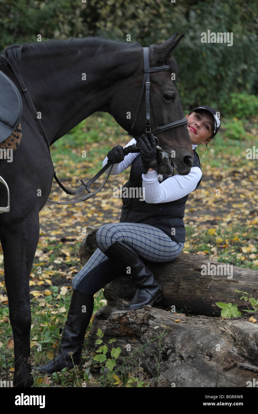 Young woman posing horse mare hi-res stock photography and images - Alamy