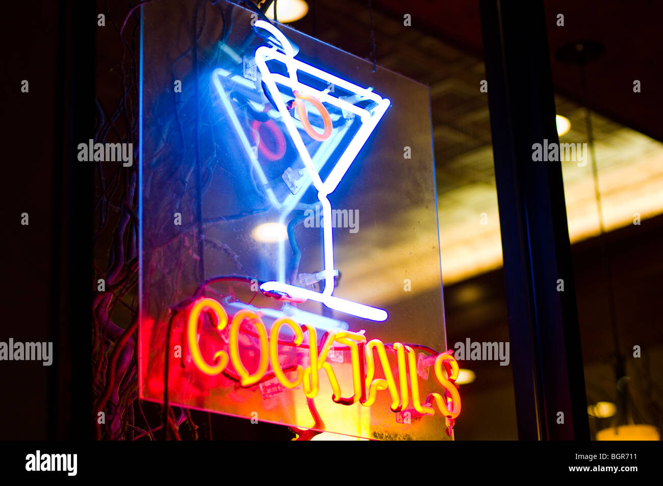 Neon sign advertising cocktails Stock Photo - Alamy