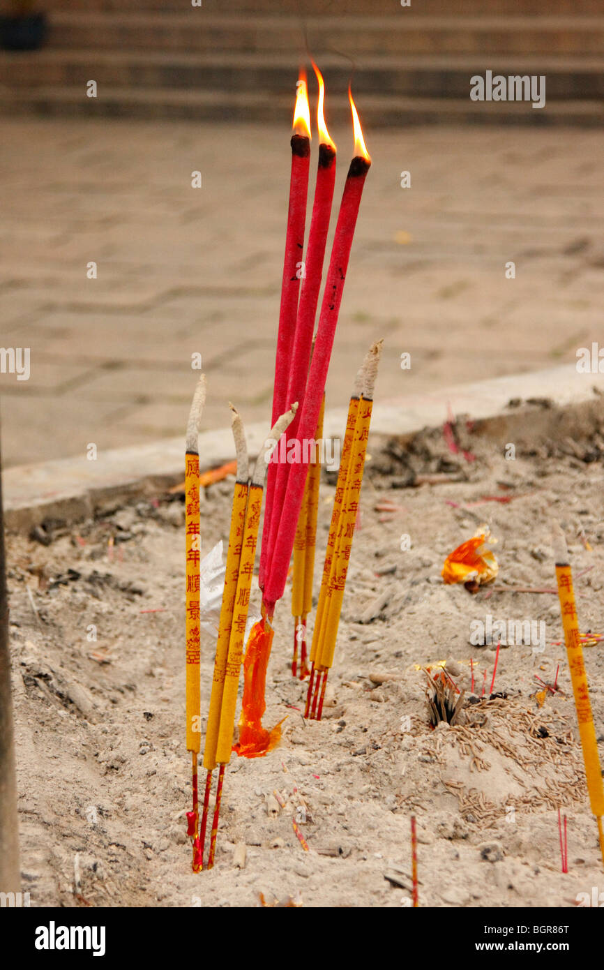Propitiatory incense in the temple of Buddha Stock Photo - Alamy