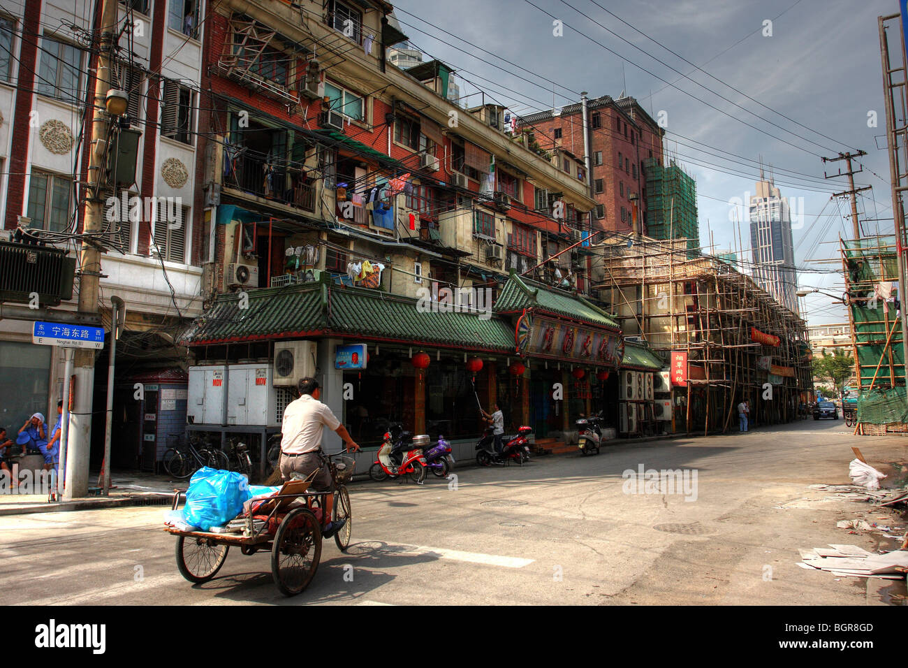Poor neighborhood near the skyscrapers of Shanghai Stock Photo - Alamy