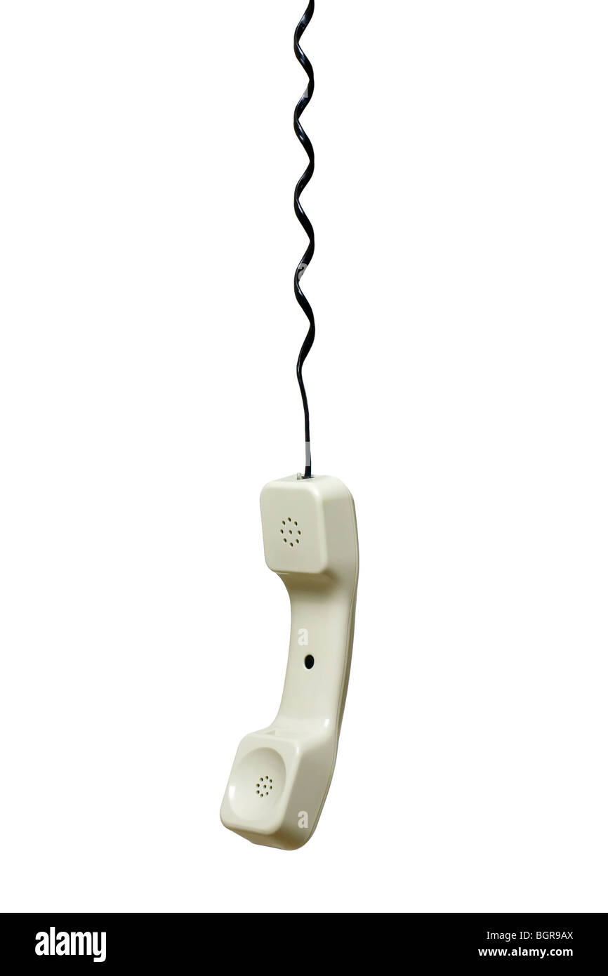 Telephone handset hanging by its cord isolated on white background ...