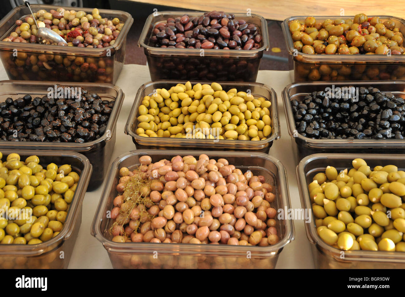 Different types of olives for sale at a French street market Stock ...