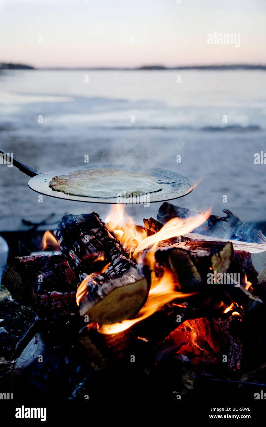 Pancakes made over open fire Stock Photo - Alamy