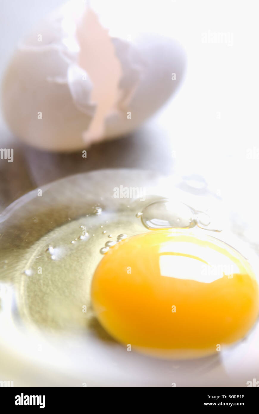 A cracked egg, close-up Stock Photo - Alamy