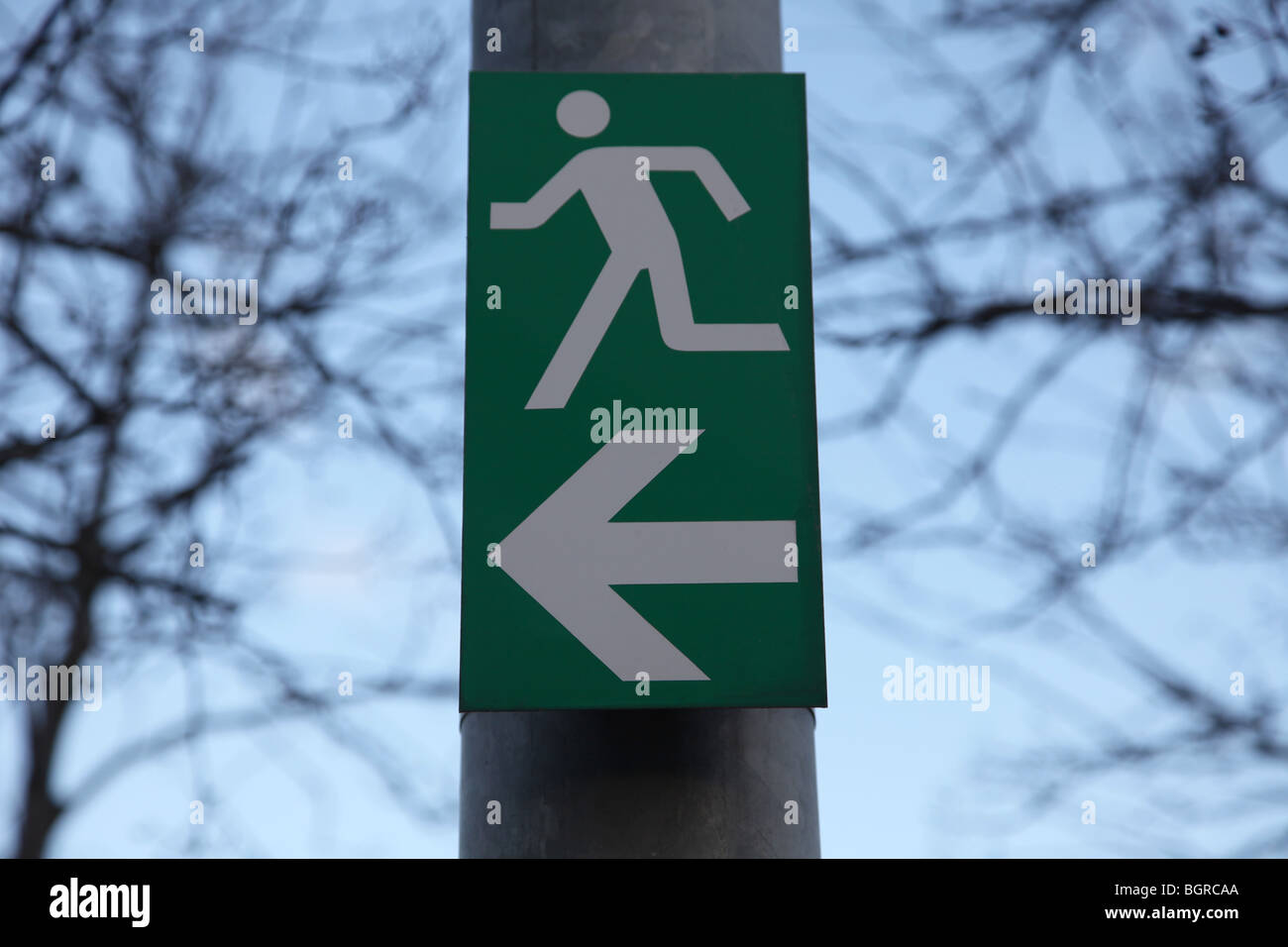 Emergency exit public sign Stock Photo - Alamy