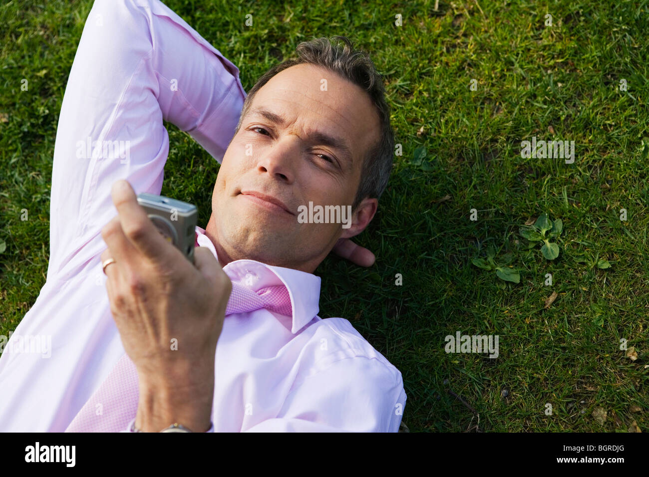Businessman using a mobile phone, Stockholm, Sweden Stock Photo - Alamy