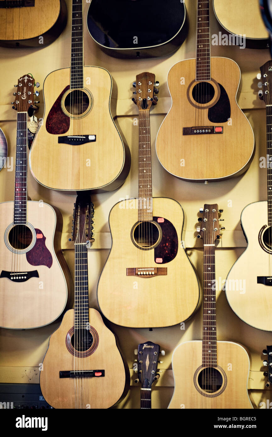 Group playing guitars inside hi-res stock photography and images - Alamy