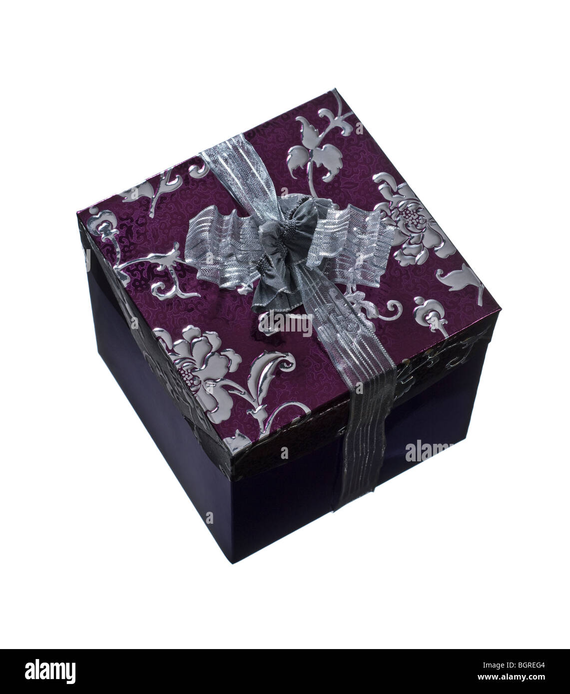 A wrapped gift against a white background Stock Photo - Alamy